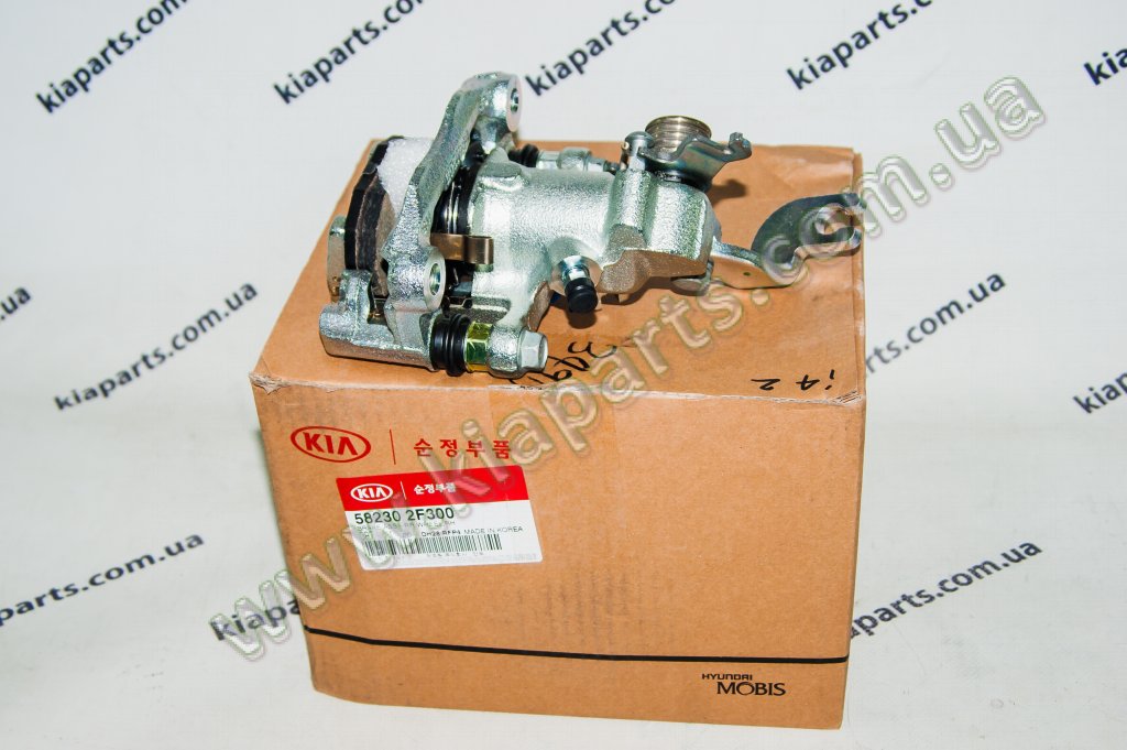 Купить Супорт гальмівний задній правий 582302f400 Cerato 05~ По лучшей цене Kiaparts Com Ua